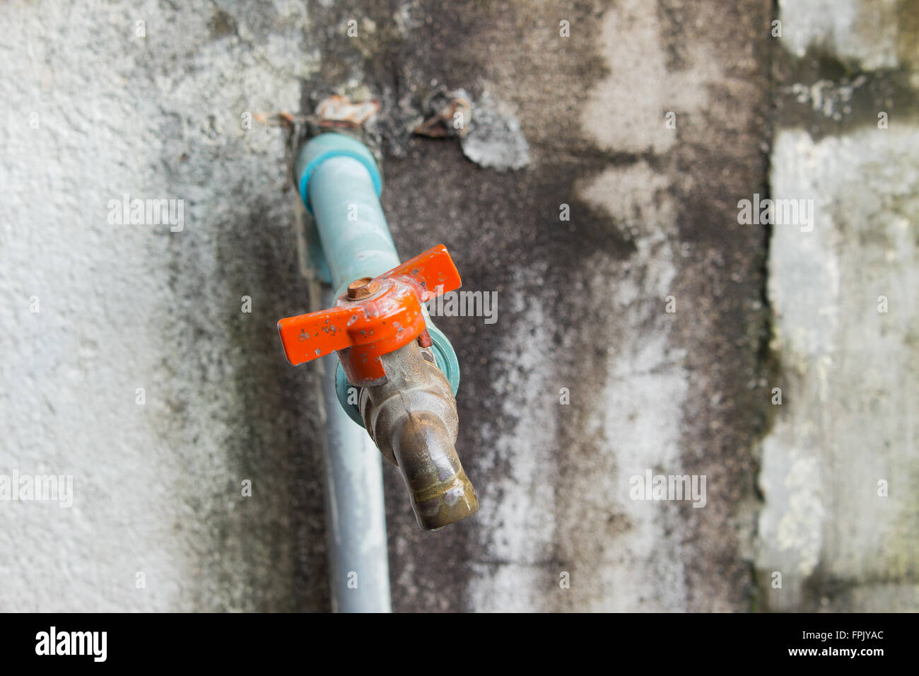 Old Water Tap in the Open and Water Drops Stock Photo - Alamy