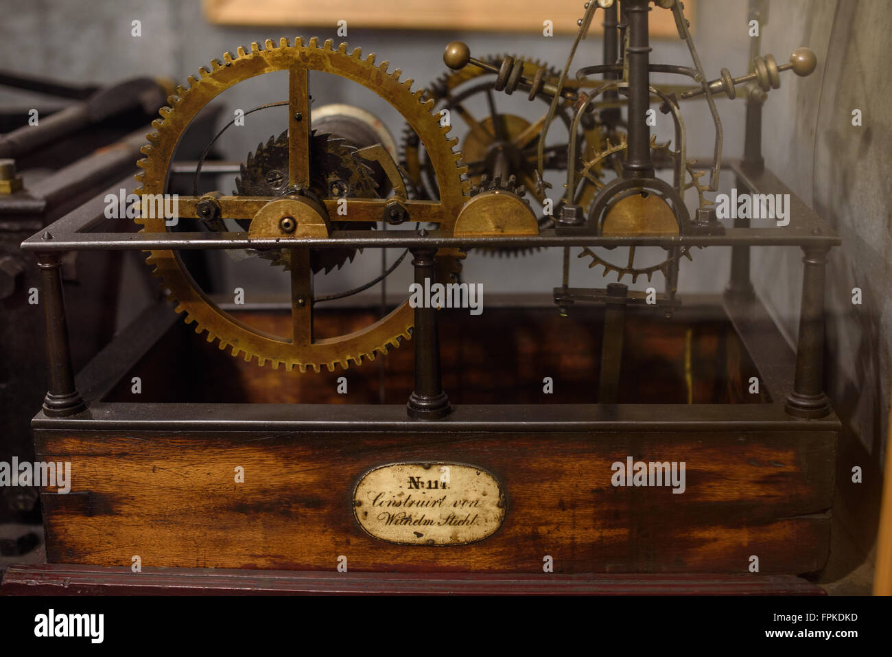 Old vintage clock with wheels and castors close up Stock Photo - Alamy