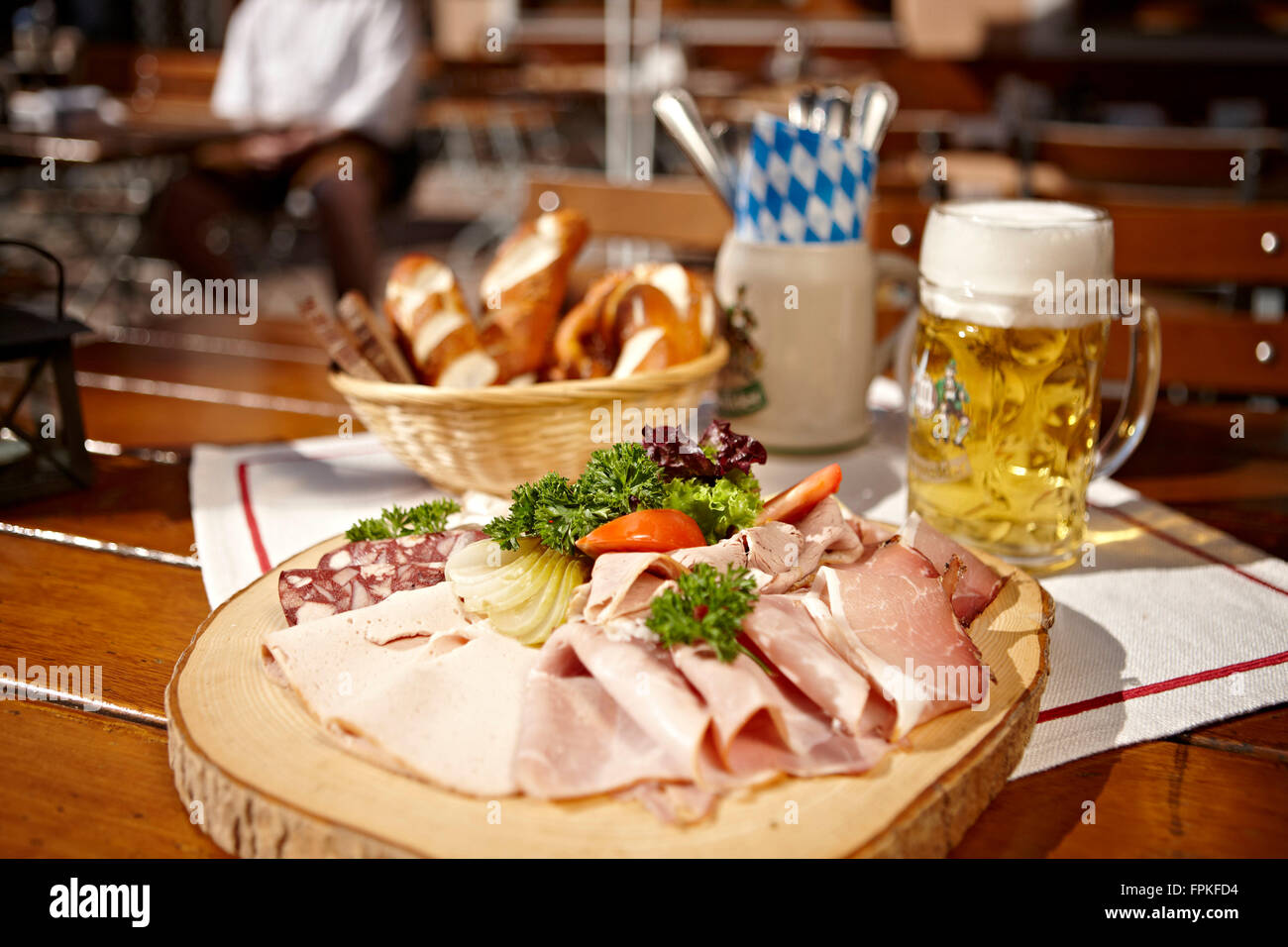 Snack on chopping board with beer Stock Photo - Alamy