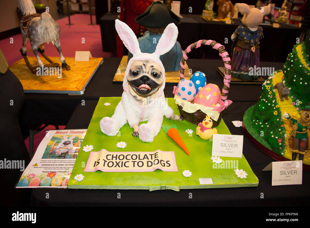 Birmingham, UK. 19th March, 2016. Pug dog easter themed cake on display ...