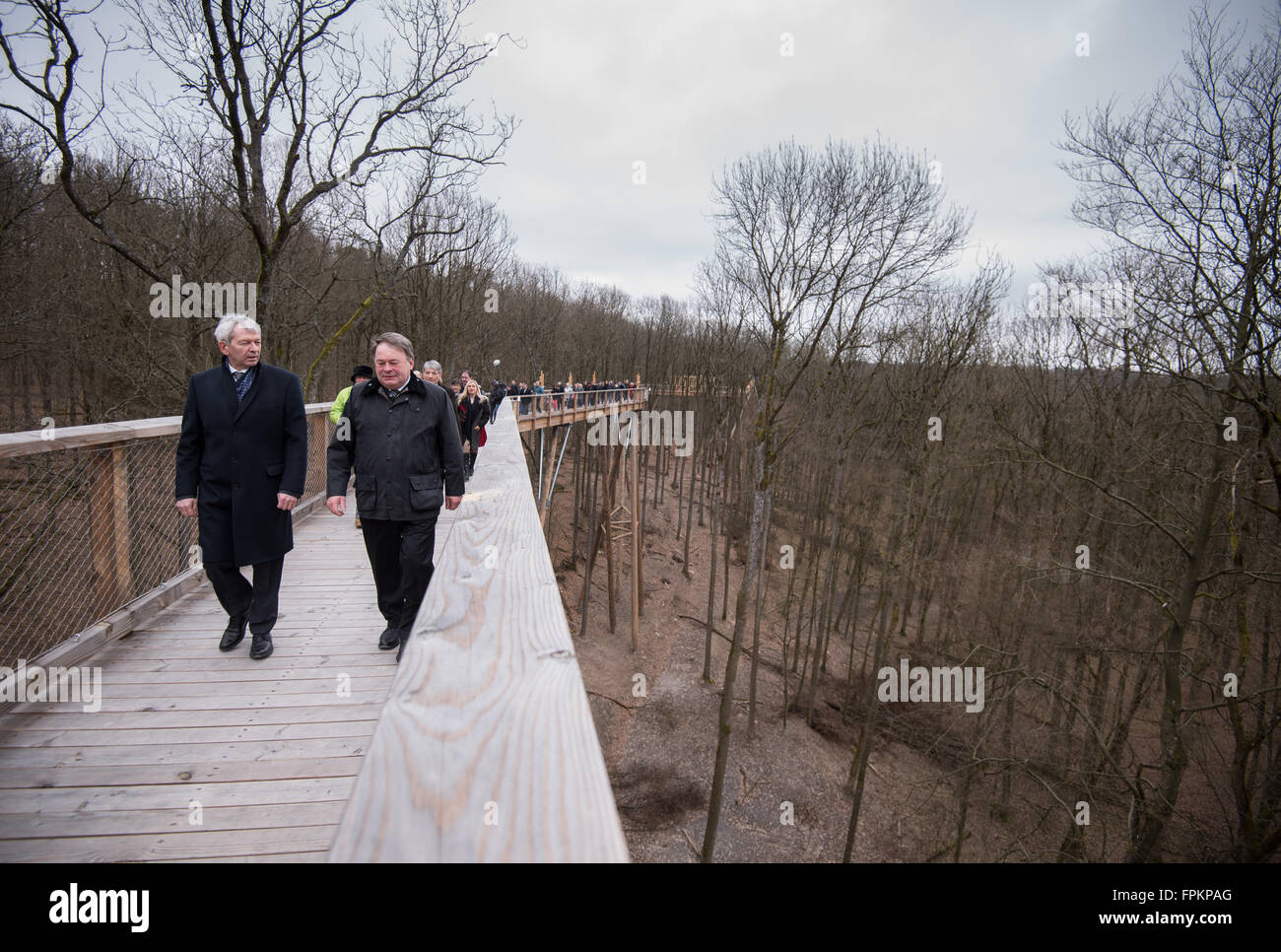 Ebrach, Germany. 19th Mar, 2016. Visitors walking up the tree top trail ...