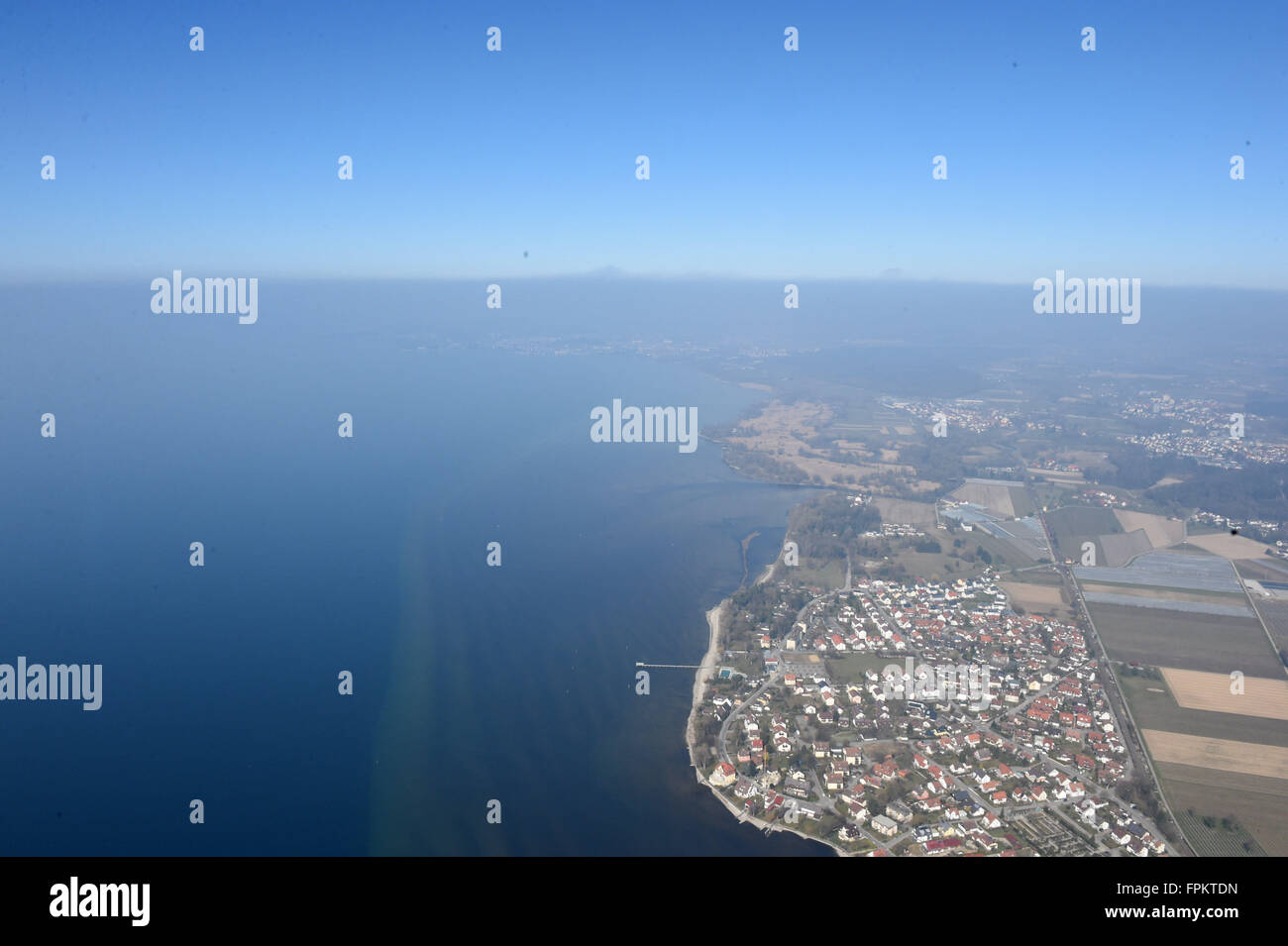 A flight with a zeppelin above Bodensee lake near Friedrichshafen ...