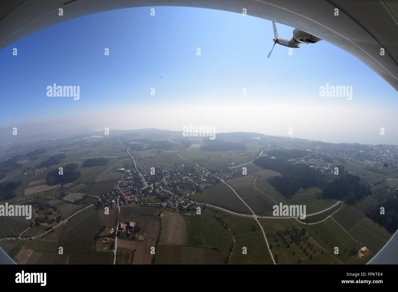 A flight with a zeppelin above Bodensee lake near Friedrichshafen ...
