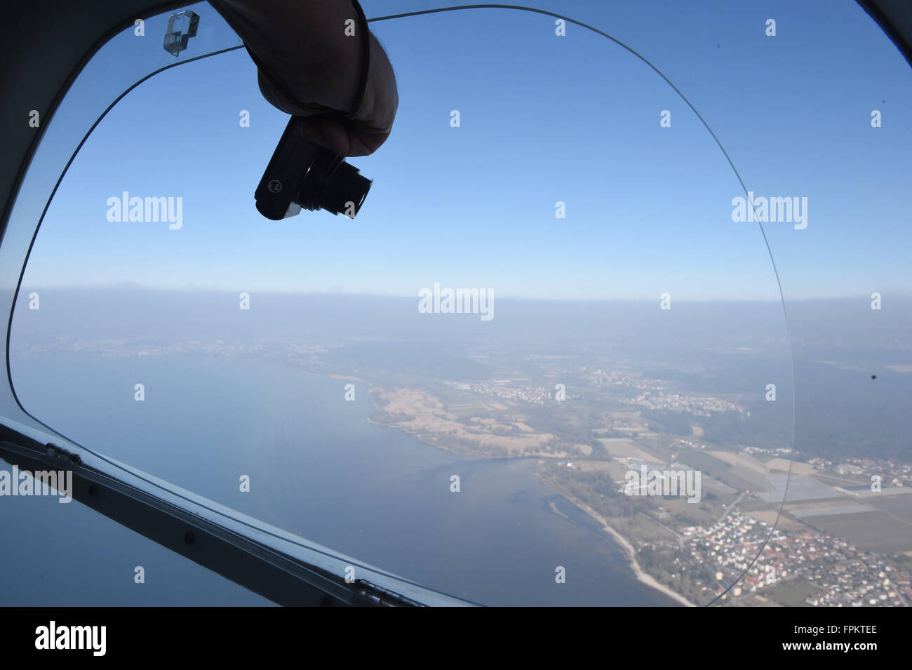 A flight with a zeppelin above Bodensee lake near Friedrichshafen ...