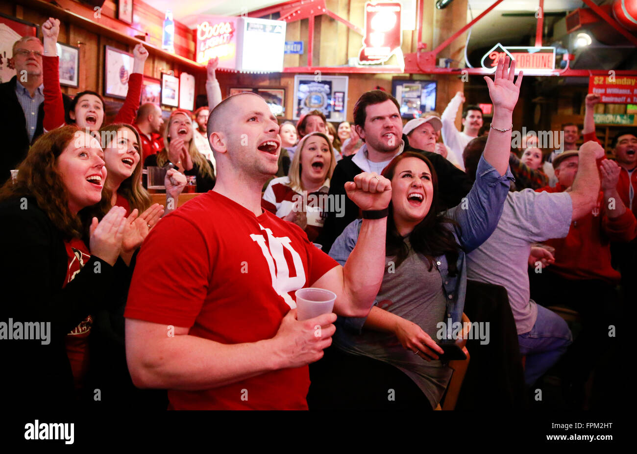 Indiana University fans, left to right, Kasey Cadwell, Mike McClain ...