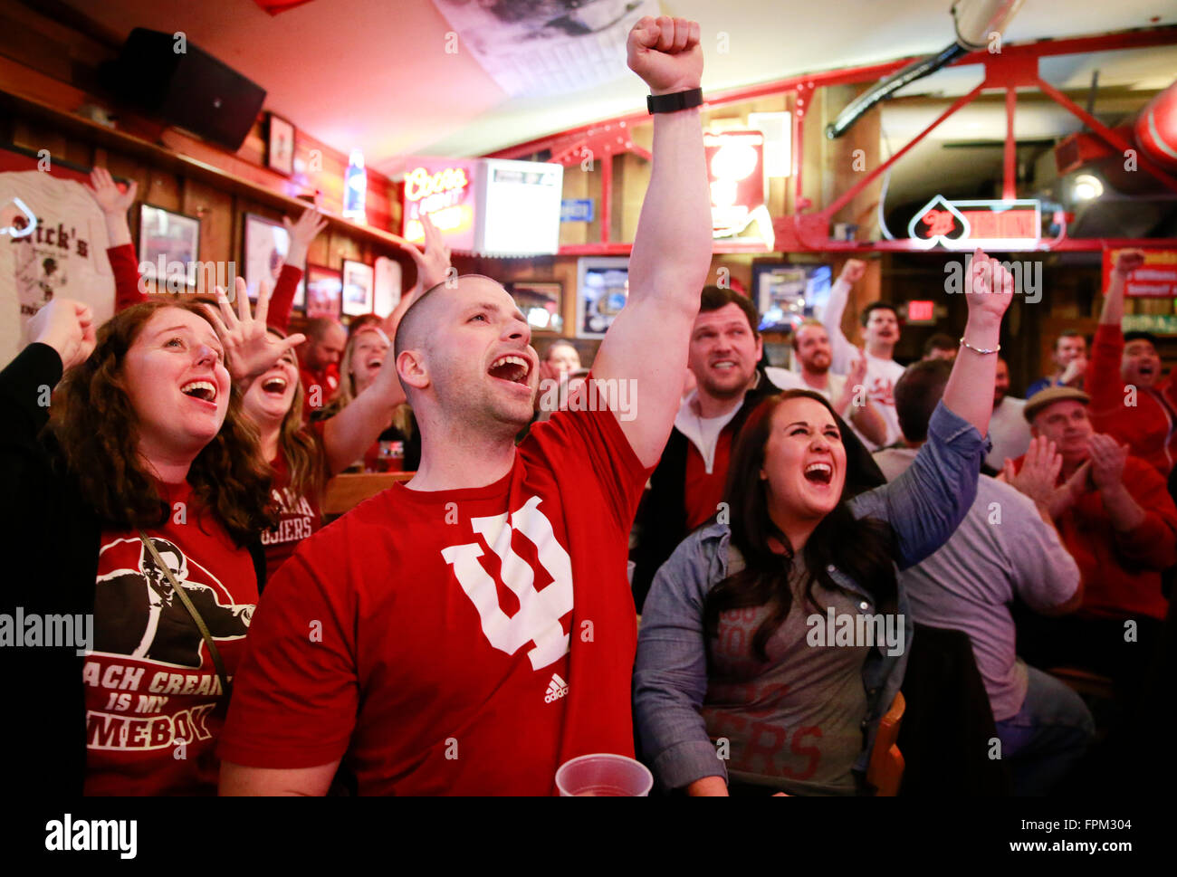 Indiana University fans, left to right, Kasey Cadwell, Mike McClain ...