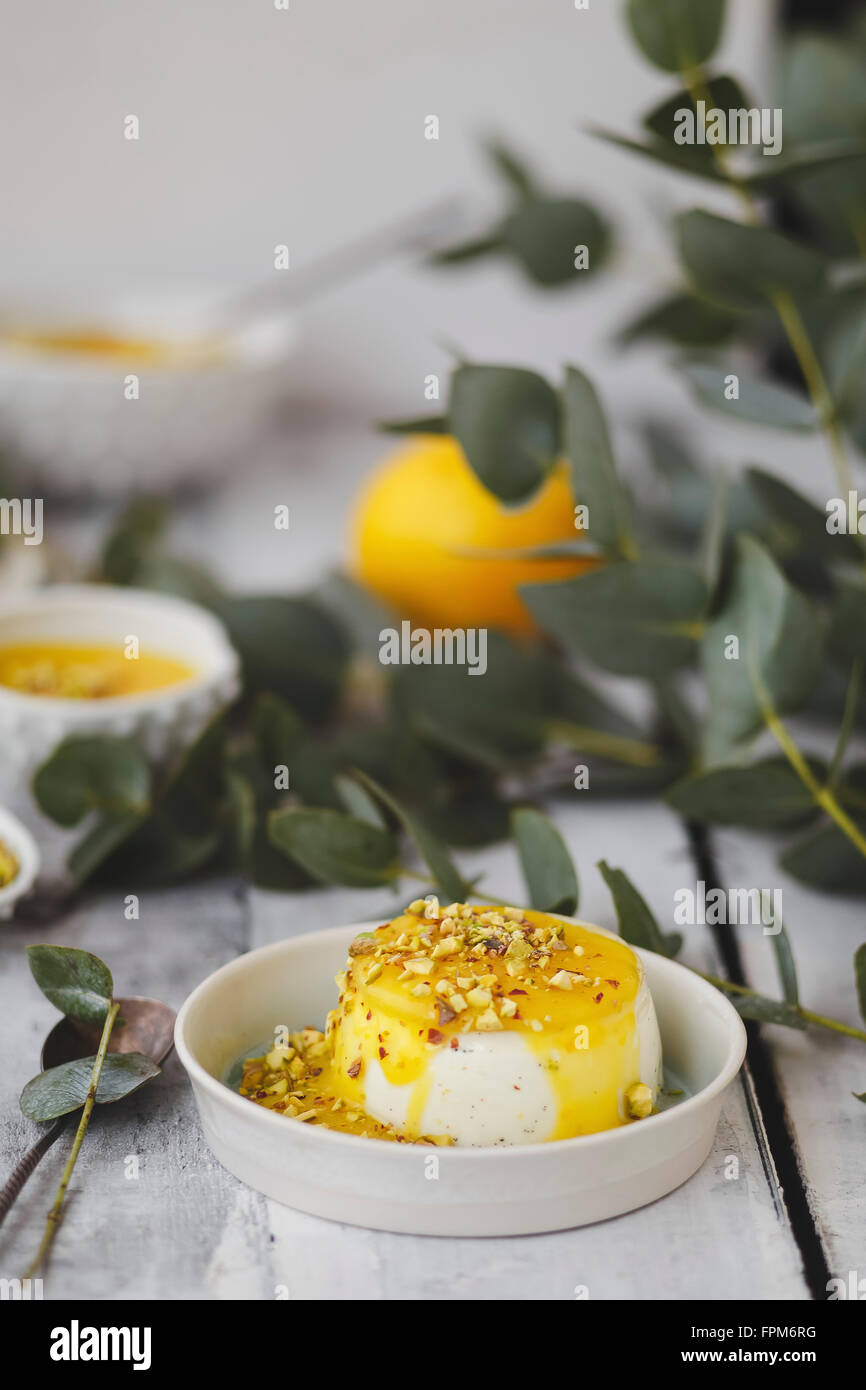 Lemon curd panna cotta Stock Photo - Alamy