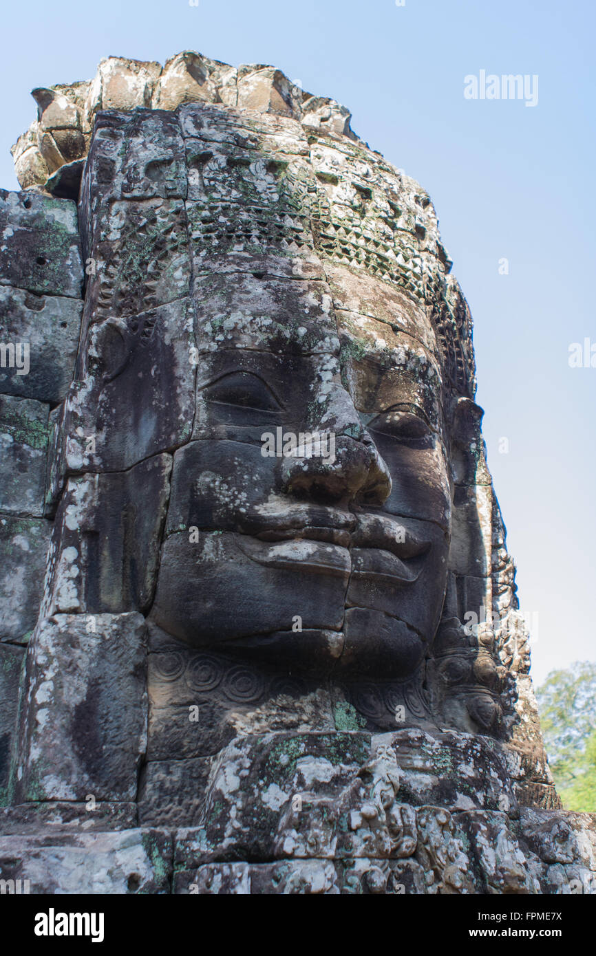 Stone head on towers of Bayon temple in Angkor Thom, Cambodia Stock ...