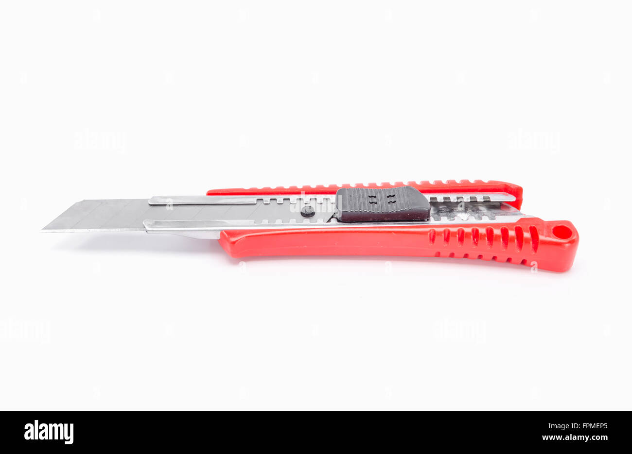 Red - stainless cutter knife on white background Stock Photo - Alamy
