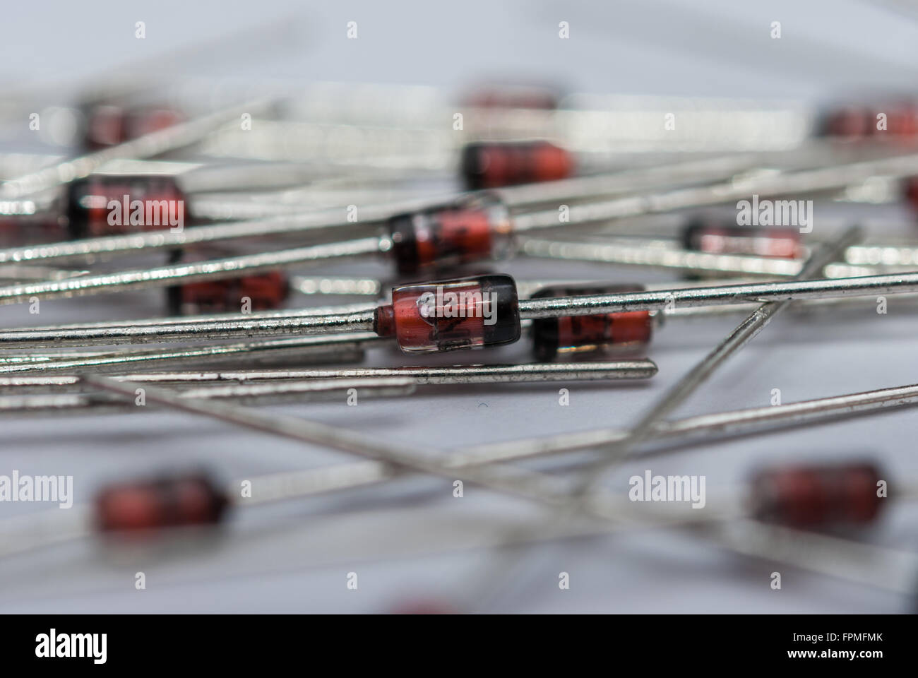 Pile of power diodes on the white background closeup Stock Photo - Alamy