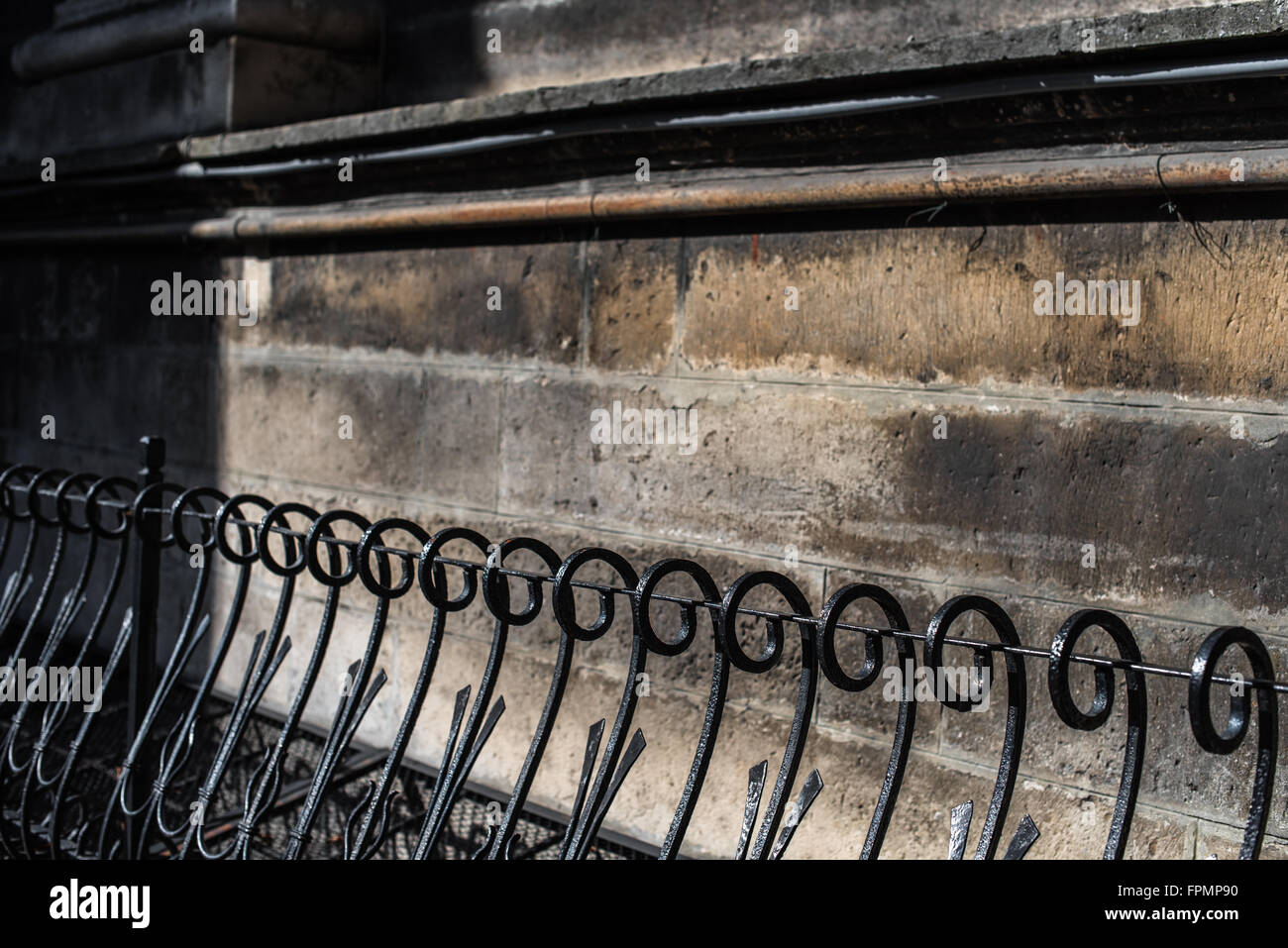 Black forged fence at the old monument. Ancient city architecture Stock ...
