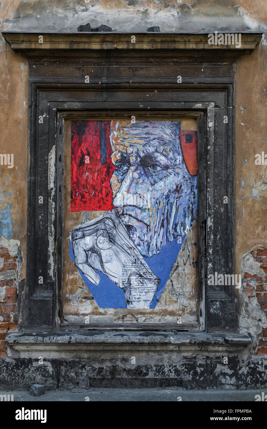 Interesting mural on the old wall. Street art Stock Photo - Alamy