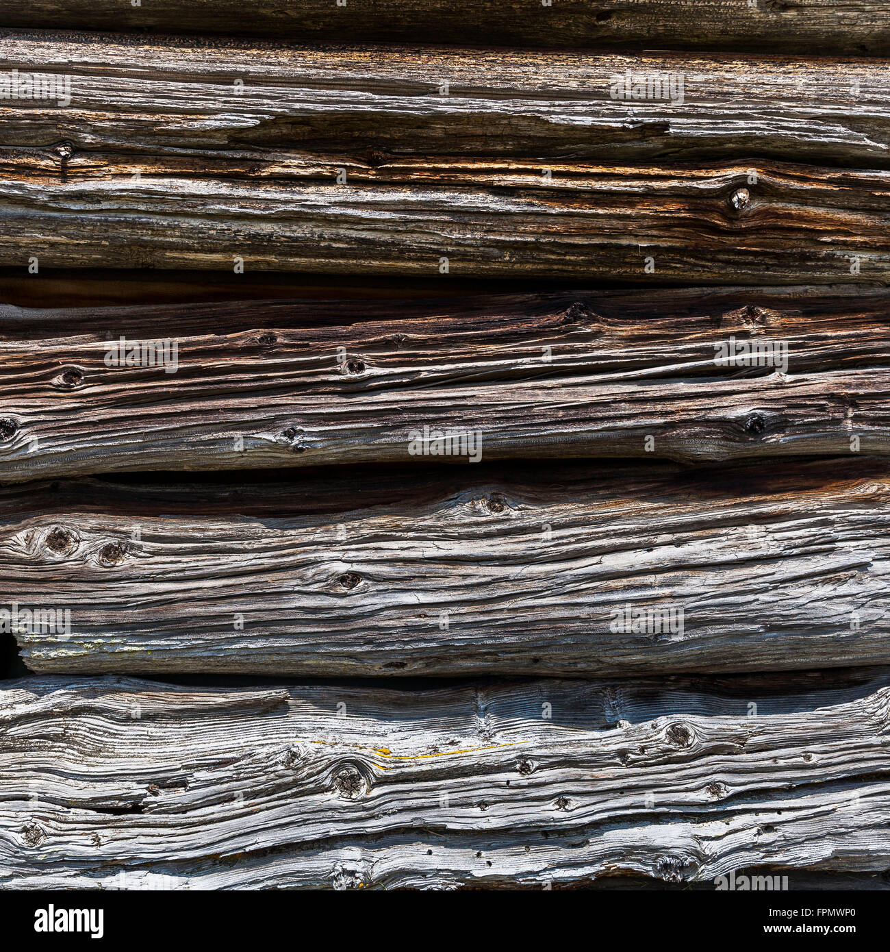 Wooden wall from old untreated grey beams, South Tyrol, Italy, Europe ...