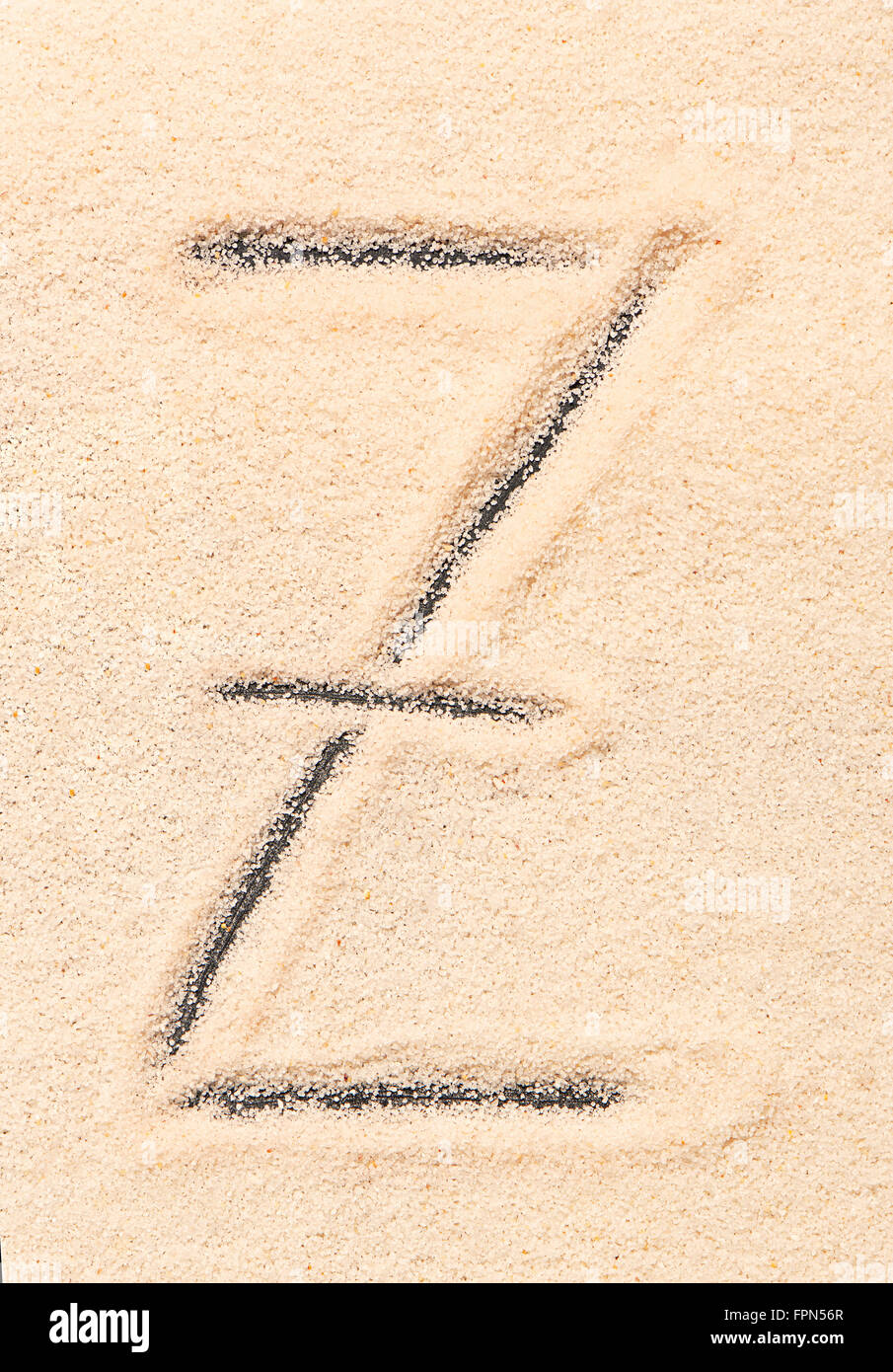 Z letter written on sand Stock Photo - Alamy