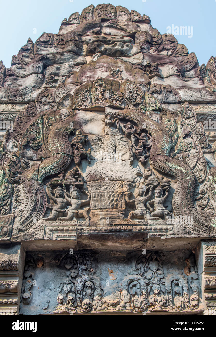 Dramatic relief with dancing girls, snakes, animals and human figures ...