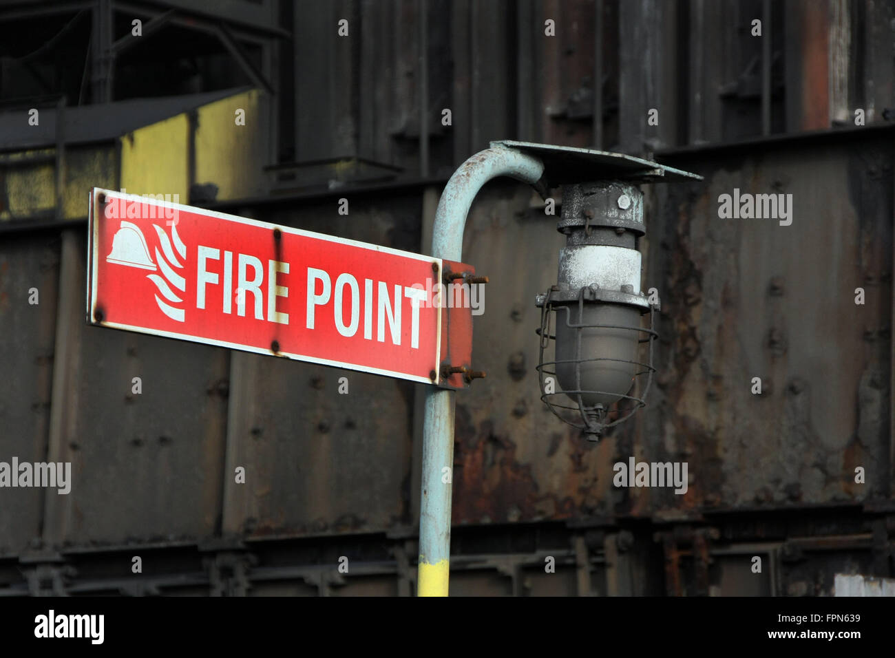 Fire point sign with light Stock Photo - Alamy
