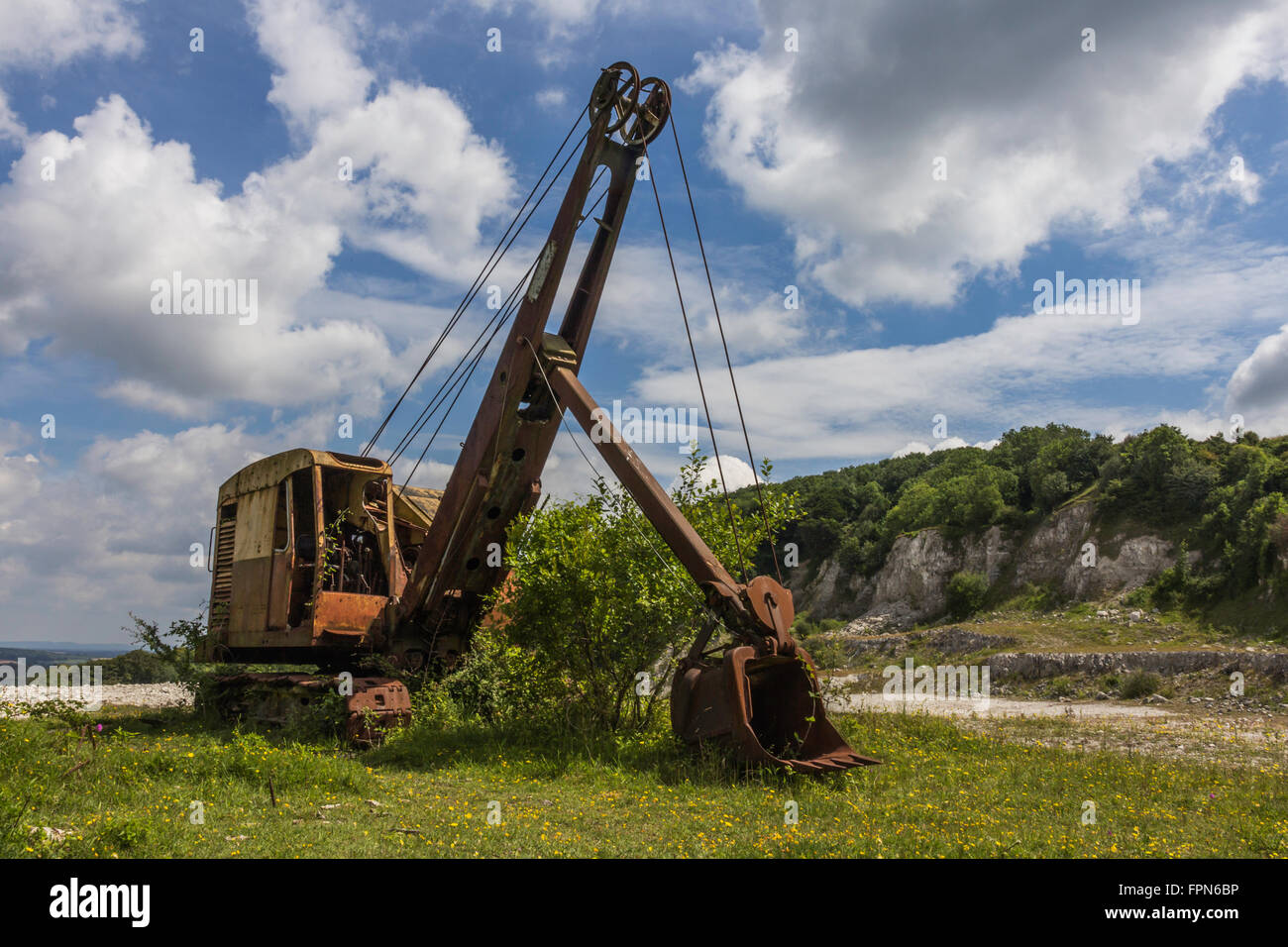 Old digger in chalk pit Stock Photo - Alamy