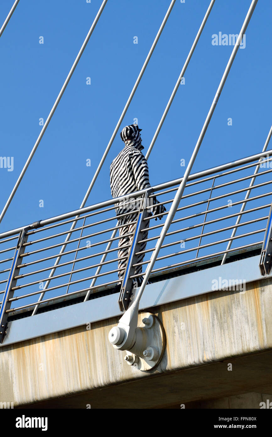 London, England, UK. 'Human Statue' on the Golden Jubilee Bridge ...