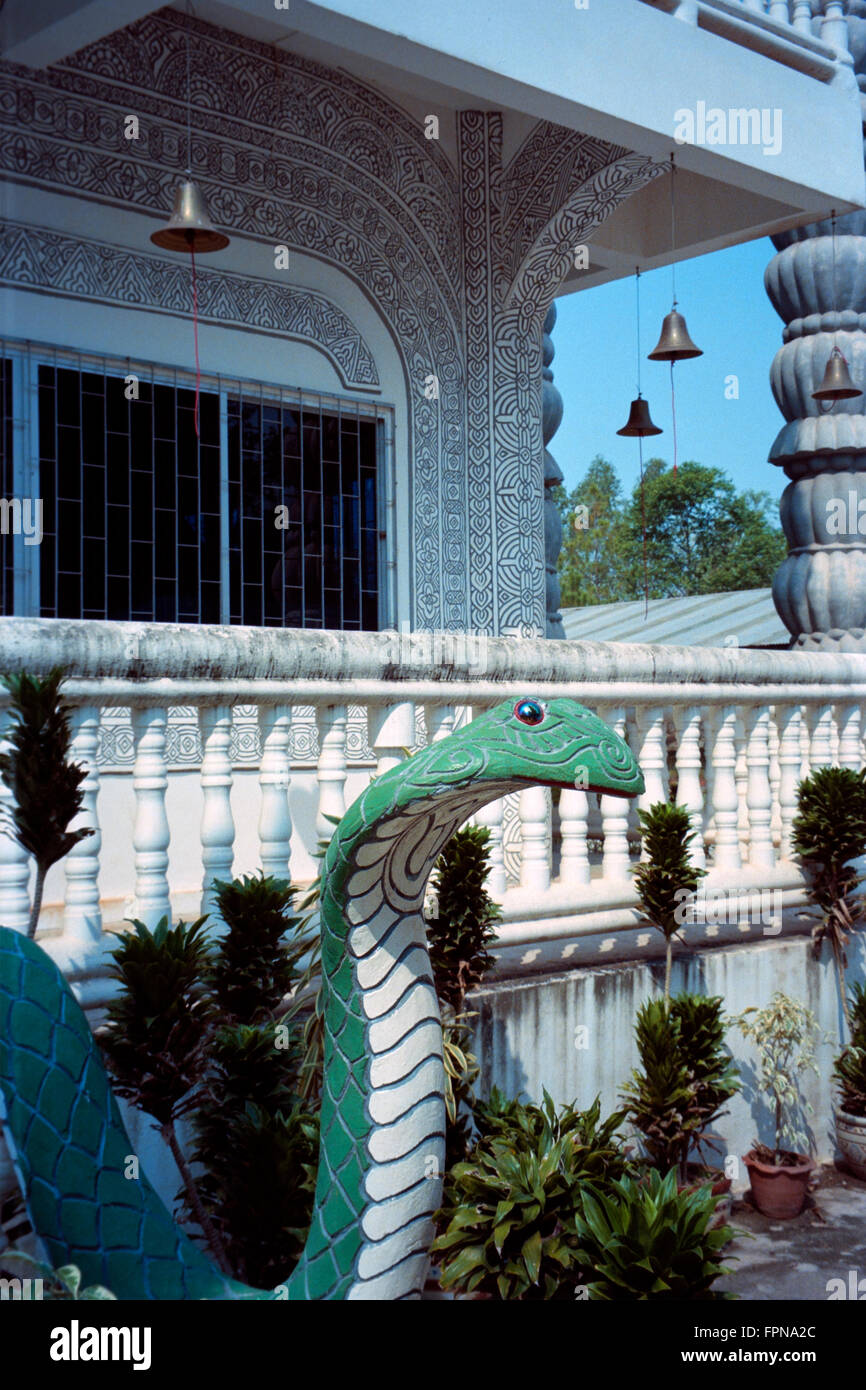 Statue in front snake temple hi-res stock photography and images - Alamy