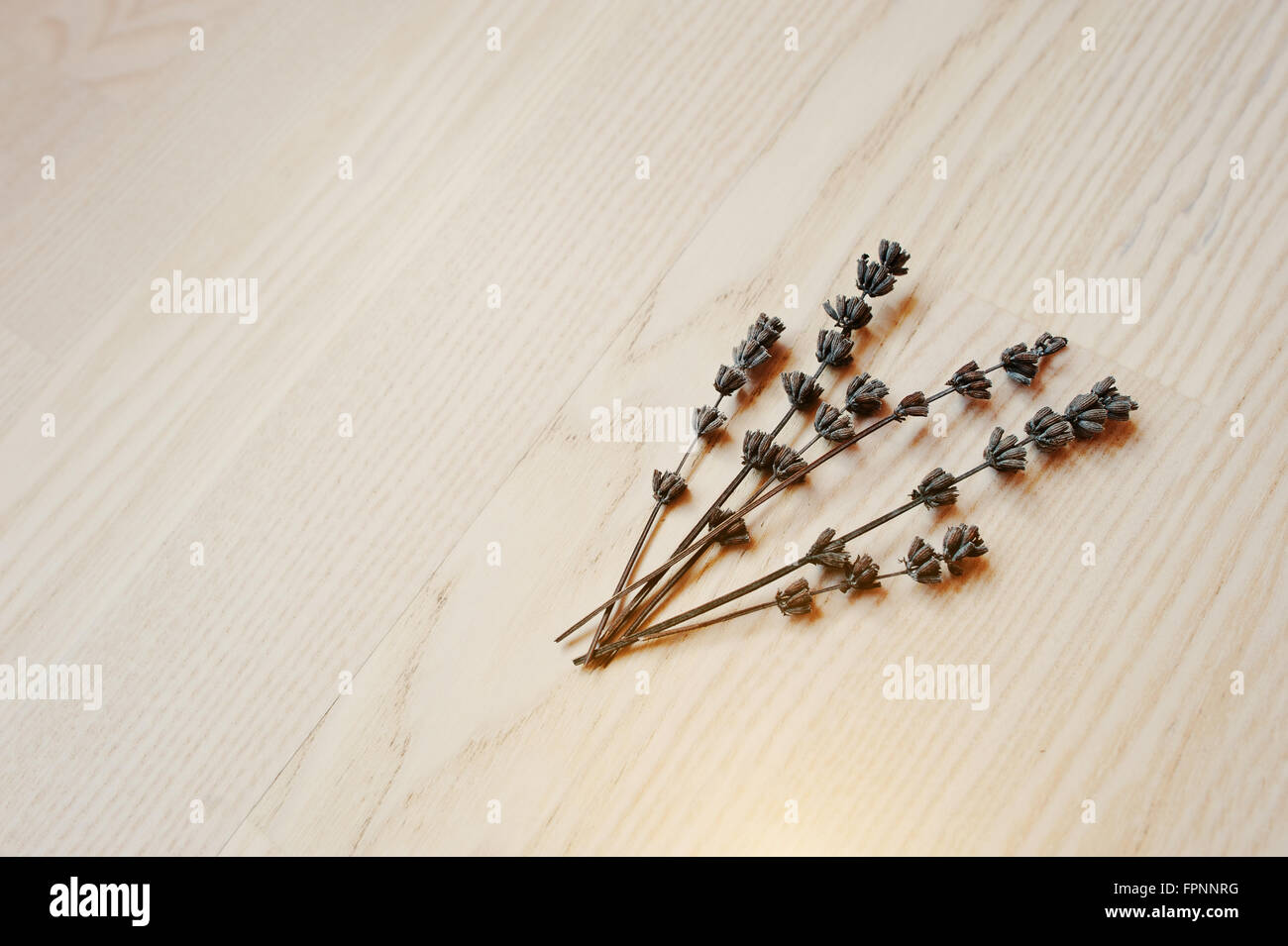 Dried lavender branches at wooden background Stock Photo - Alamy