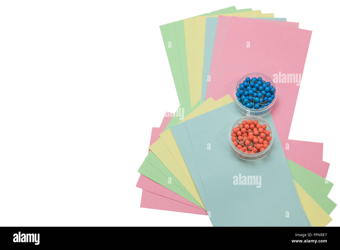 Rectangular and circular yellow, blue, red and green colored papers are ...