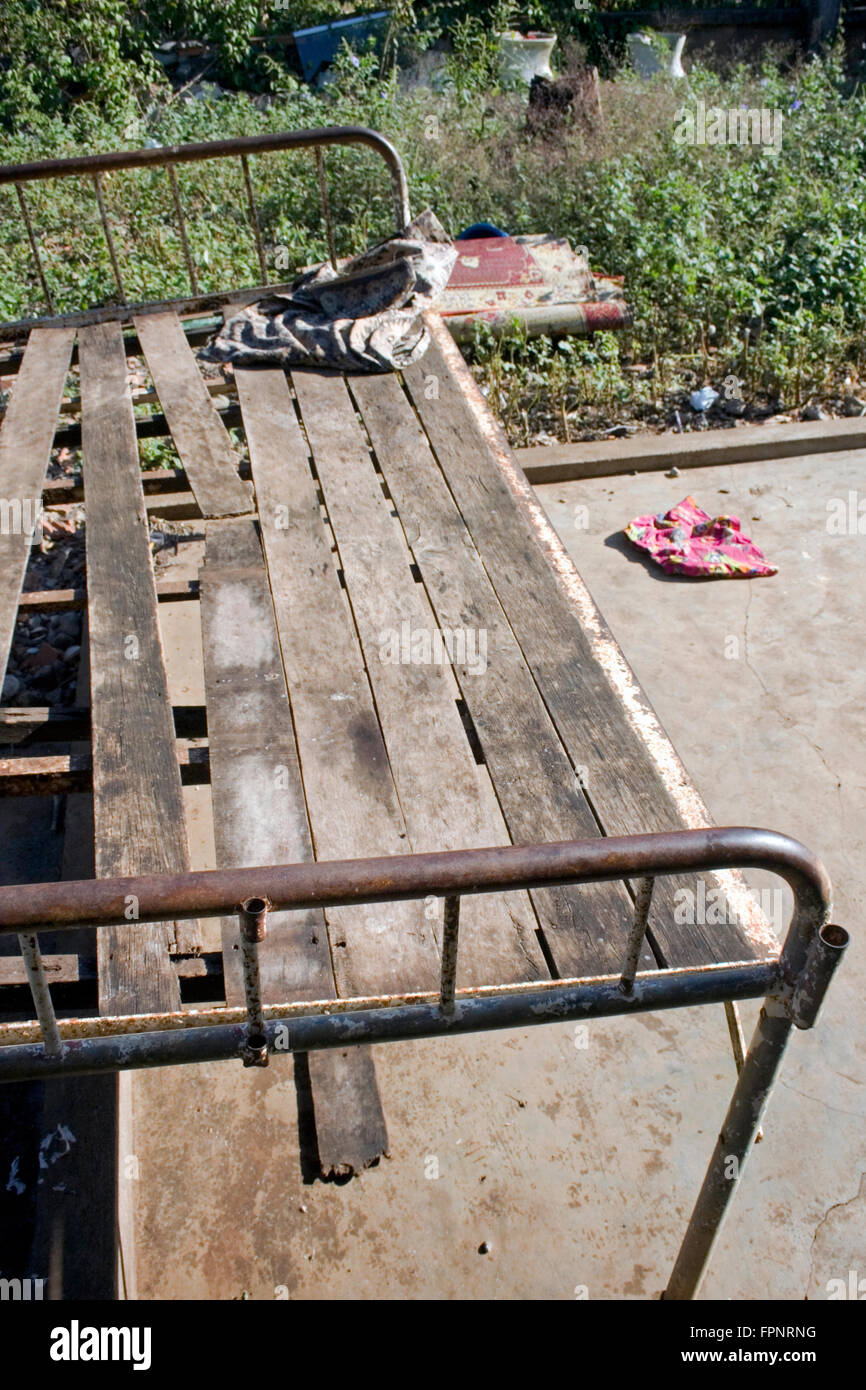 A dilapidated wooden bed sits outside Ou Reang Ov city hospital in Ou ...
