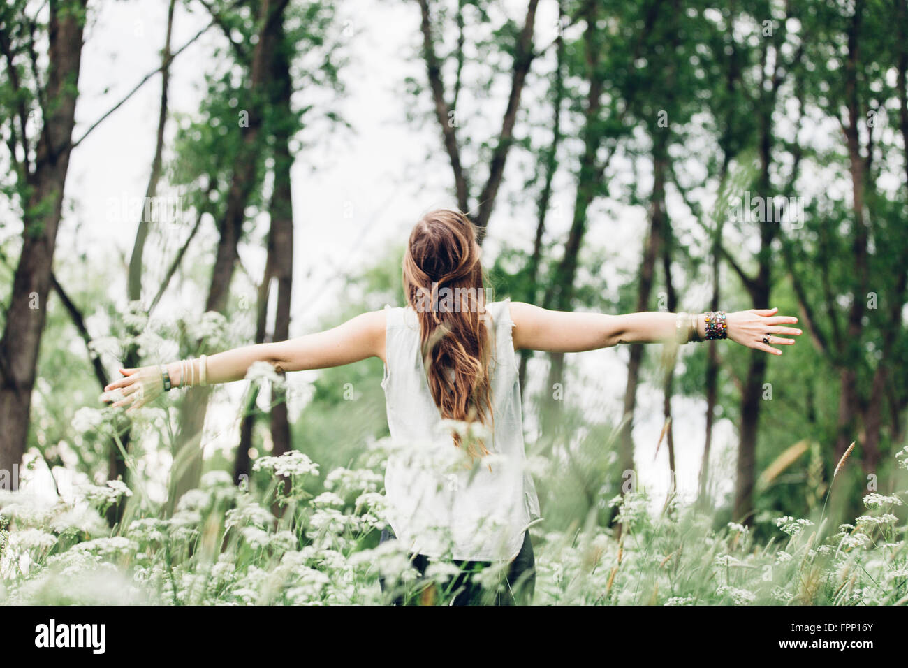 Young woman enjoying her freedom Stock Photo - Alamy