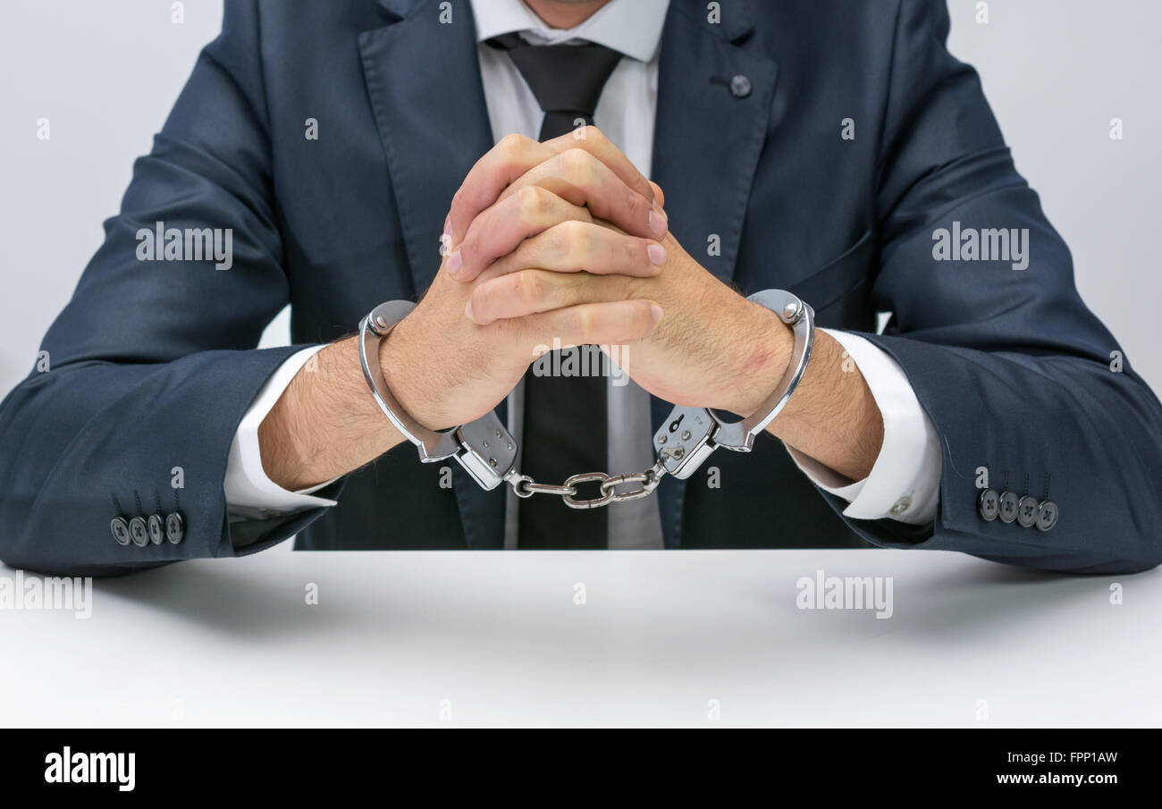Arrested handcuffs hi-res stock photography and images - Alamy