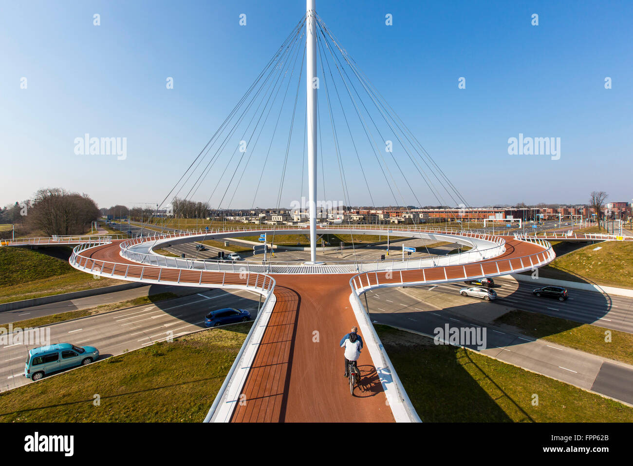 The Hovenring, a roundabout for cyclists and pedestrians, hanging over ...