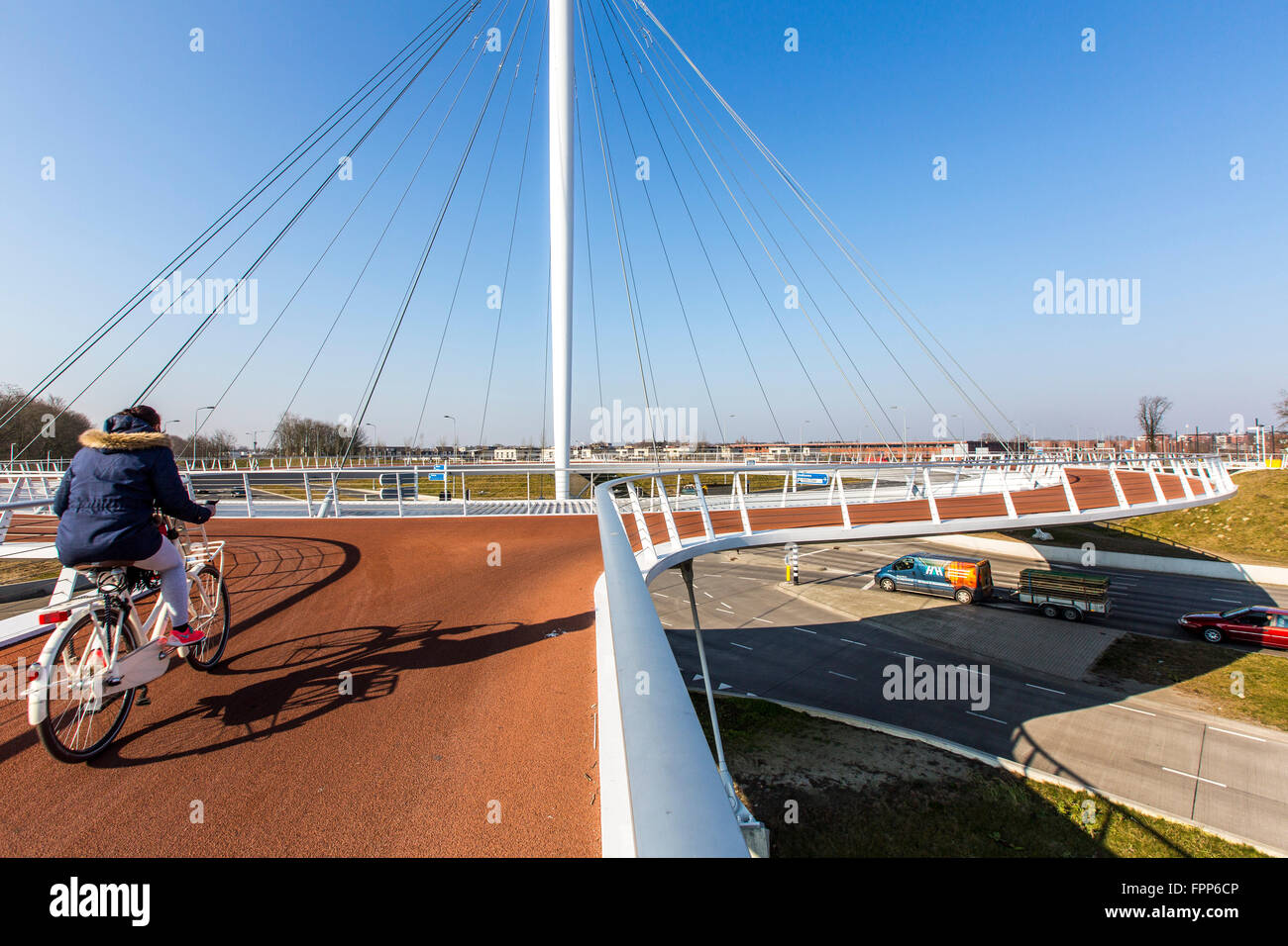 The Hovenring, a roundabout for cyclists and pedestrians, hanging over ...