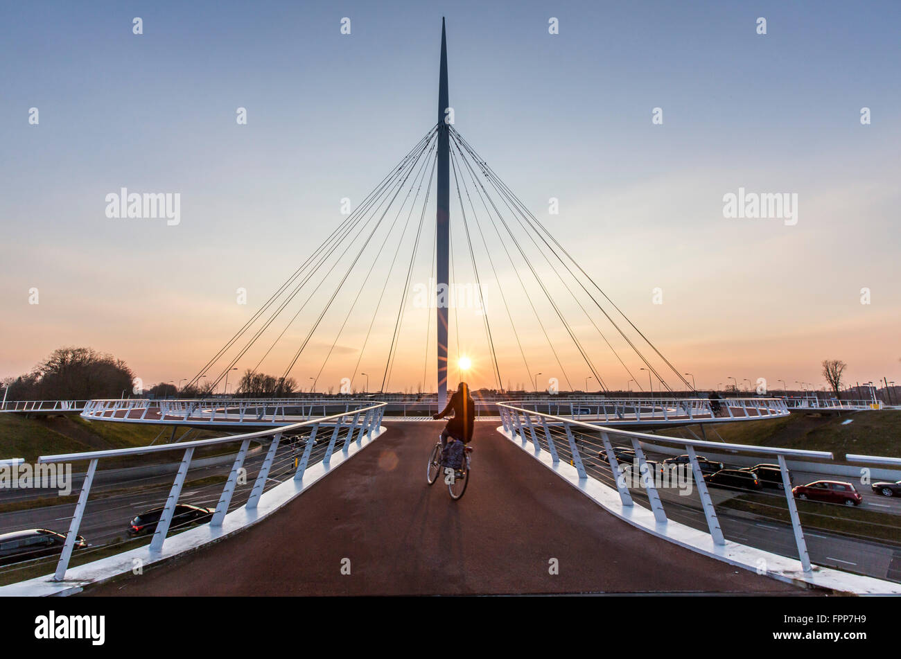 The Hovenring, a roundabout for cyclists and pedestrians, hanging over ...