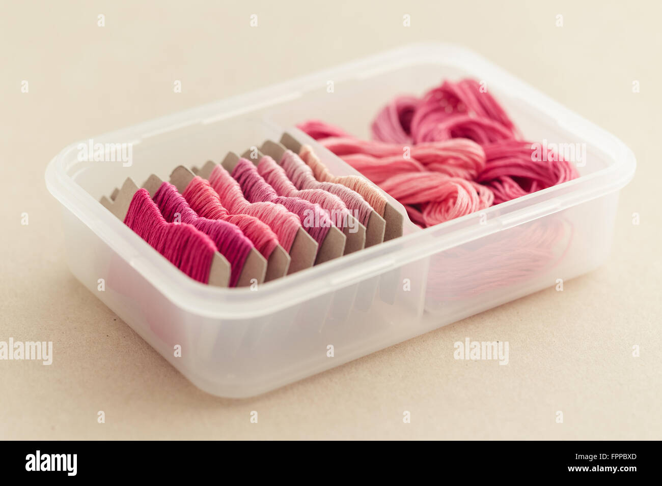 Sewing threads in pink tone Stock Photo - Alamy