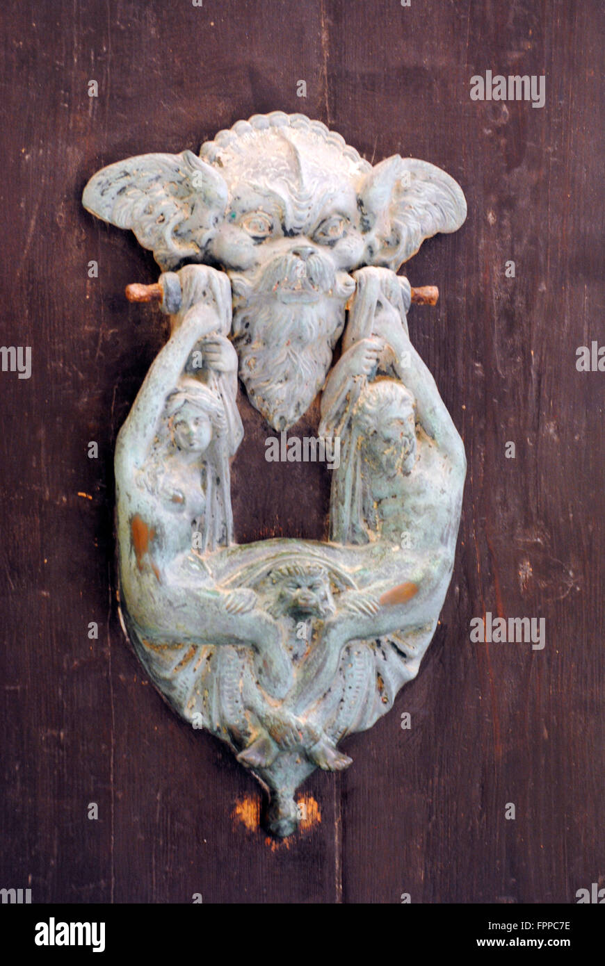 Ornate doorhandle with human figures Stock Photo - Alamy