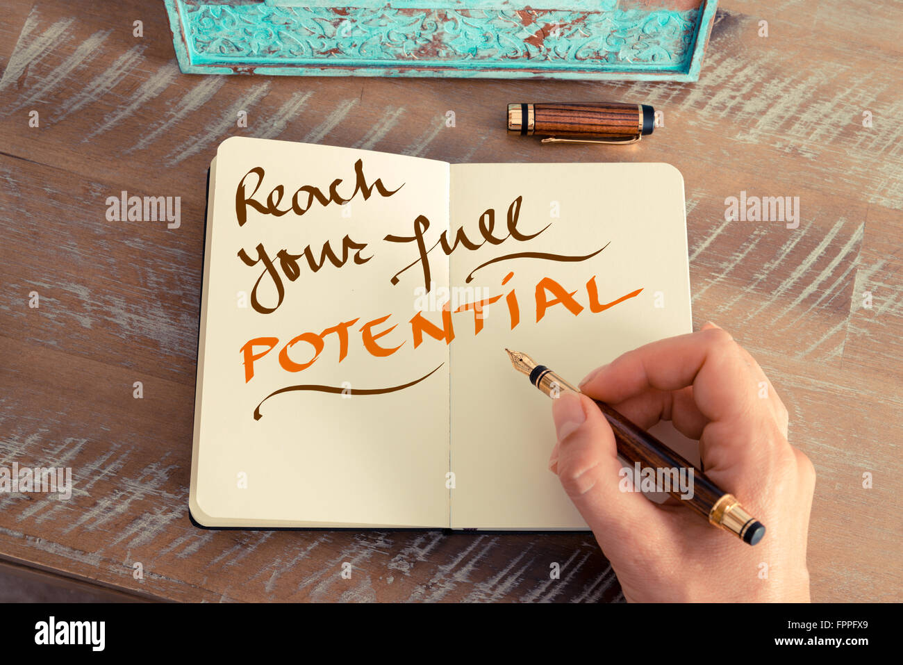 Handwritten text REACH YOUR FULL POTENTIAL, motivation concept Stock ...
