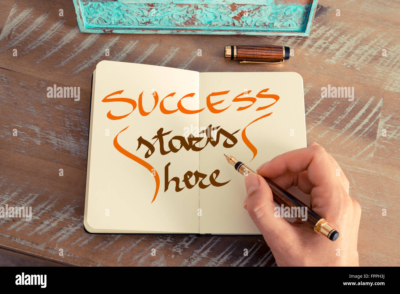 Handwritten text SUCCESS STARTS HERE, motivation concept Stock Photo ...