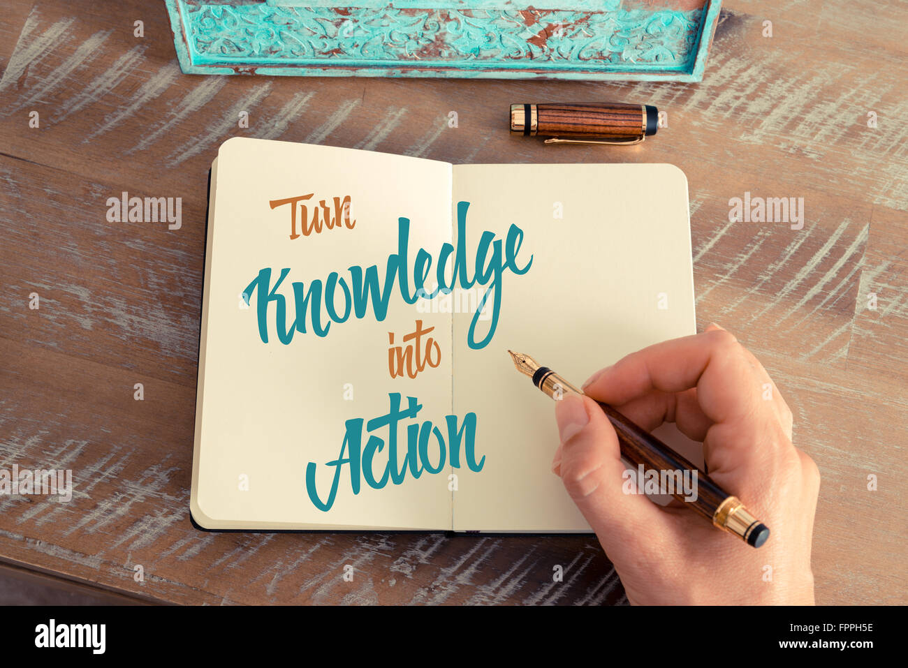 Handwritten text TURN KNOWLEDGE INTO ACTION, motivation concept Stock ...