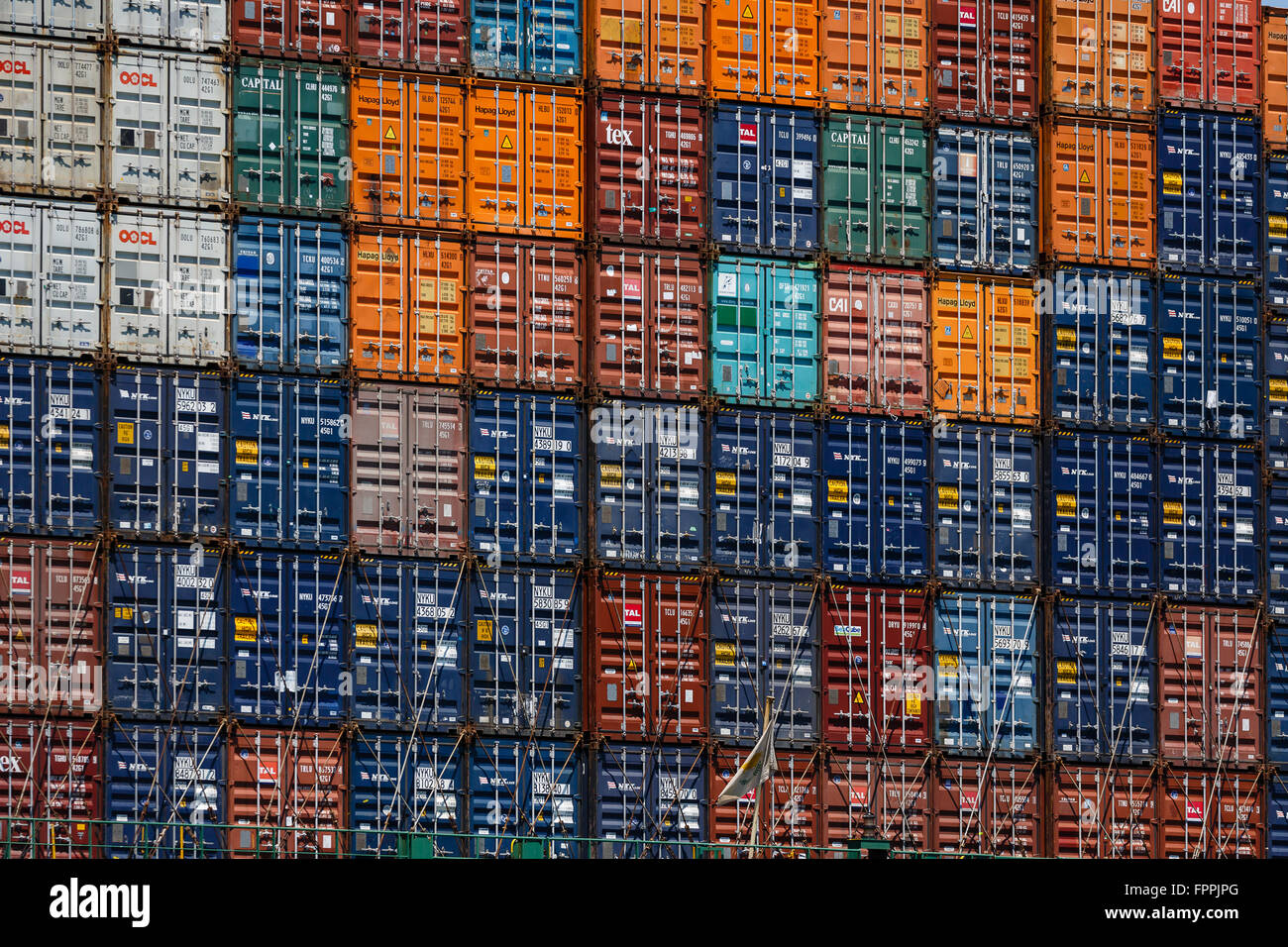 stacked cargo containers create colorful square on deck of freight ...