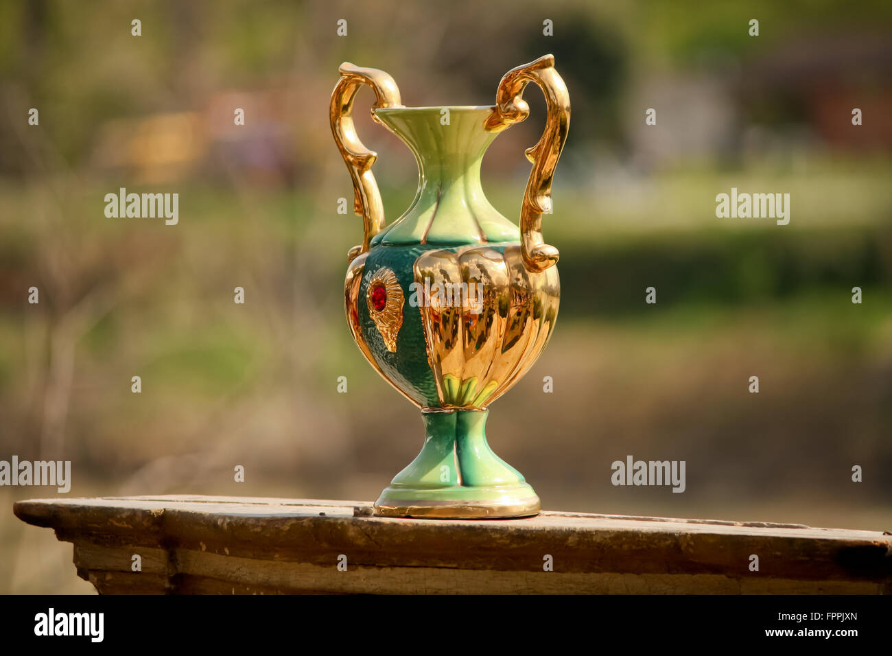 Antique Jar with ruby and golden handles Stock Photo - Alamy