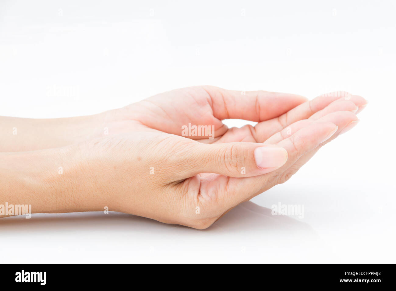 woman hands with open palms over white table Stock Photo - Alamy