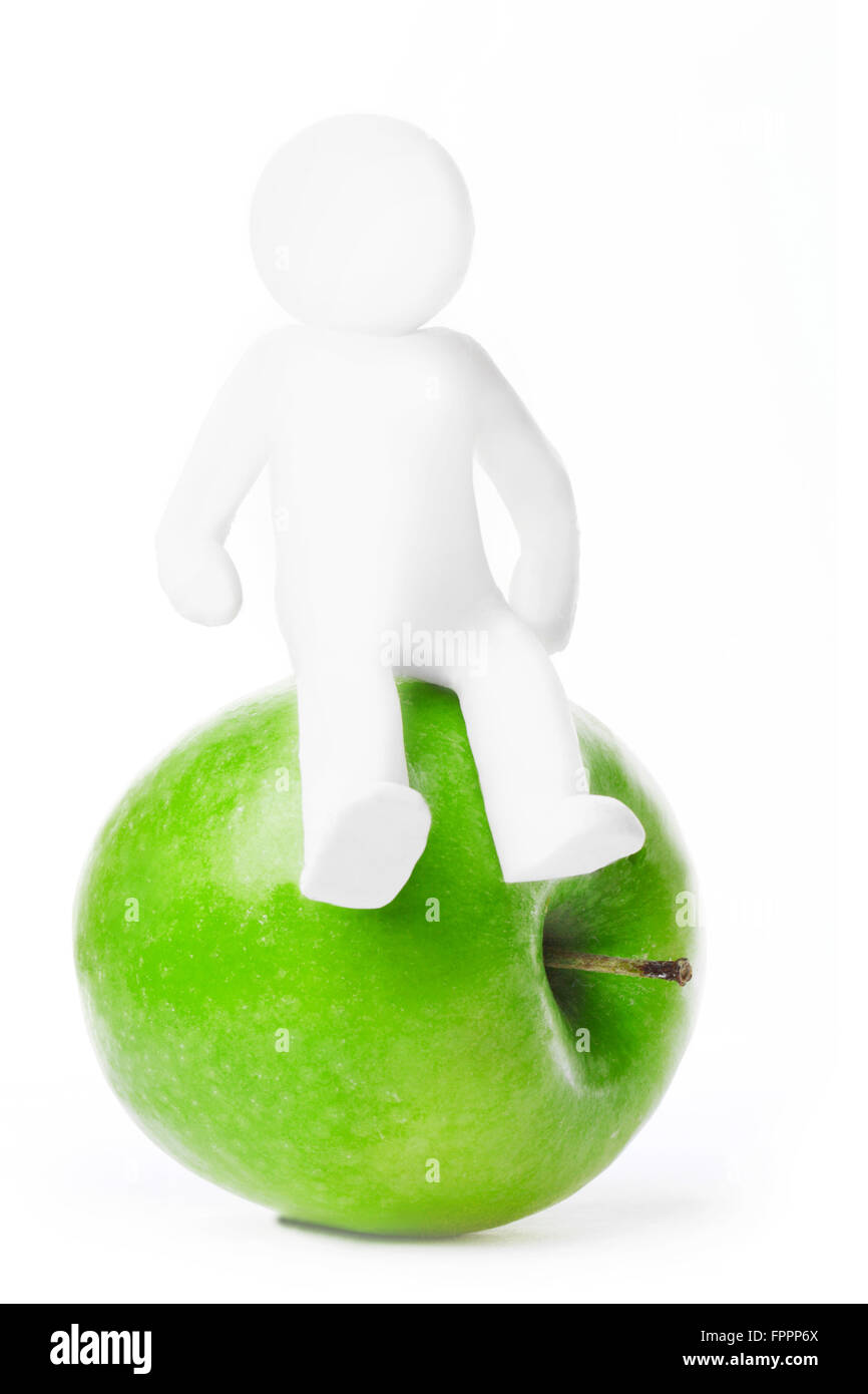 Plasticine man sitting on apple isolated on white background Stock ...