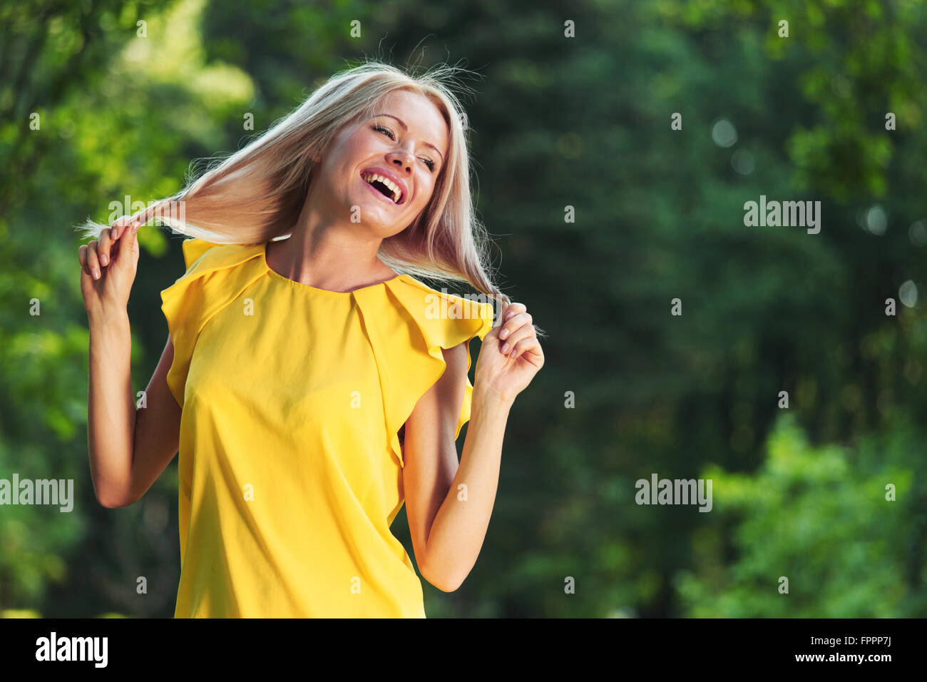 Happy woman outdoors Stock Photo - Alamy