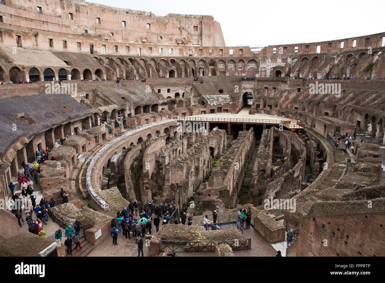 Coliseum interior Rome, tourists visiting ancient historical monuments ...