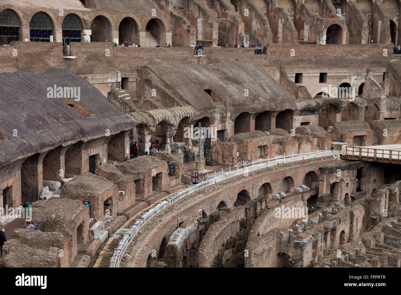 Coliseum interior Rome, tourists visiting ancient historical monuments ...