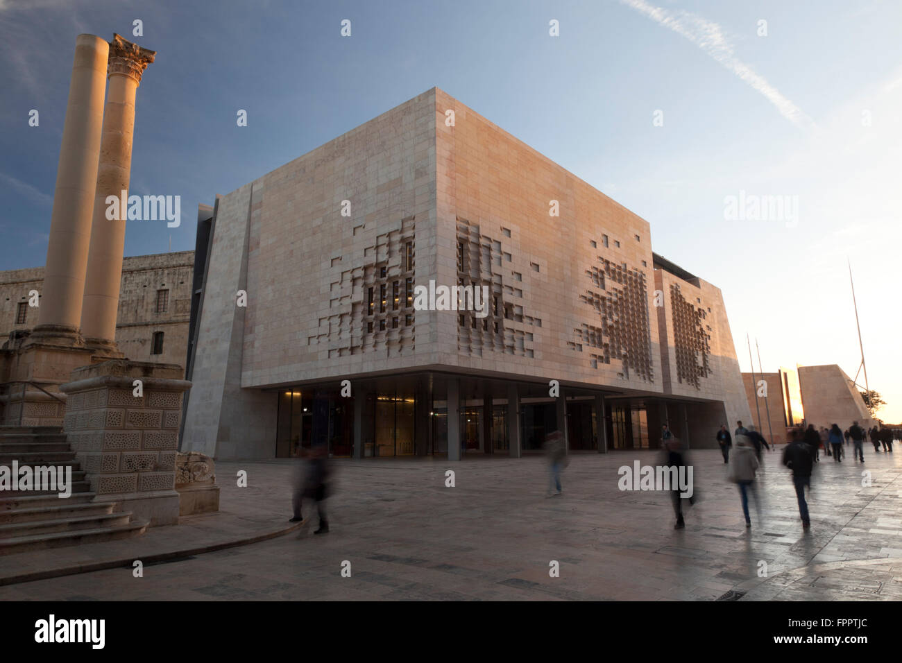 Two columns of the ruined opera house contrast with the angularity of ...