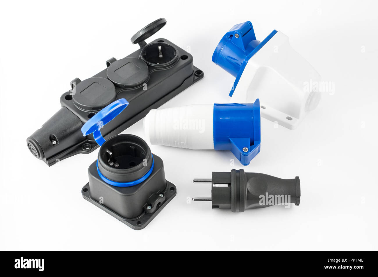 Variety of electric power plugs and sockets isolated on white ...