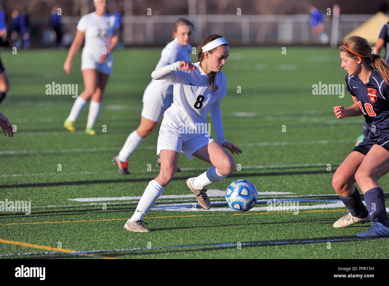 Player working to control the ball while attempting to make a cut ...