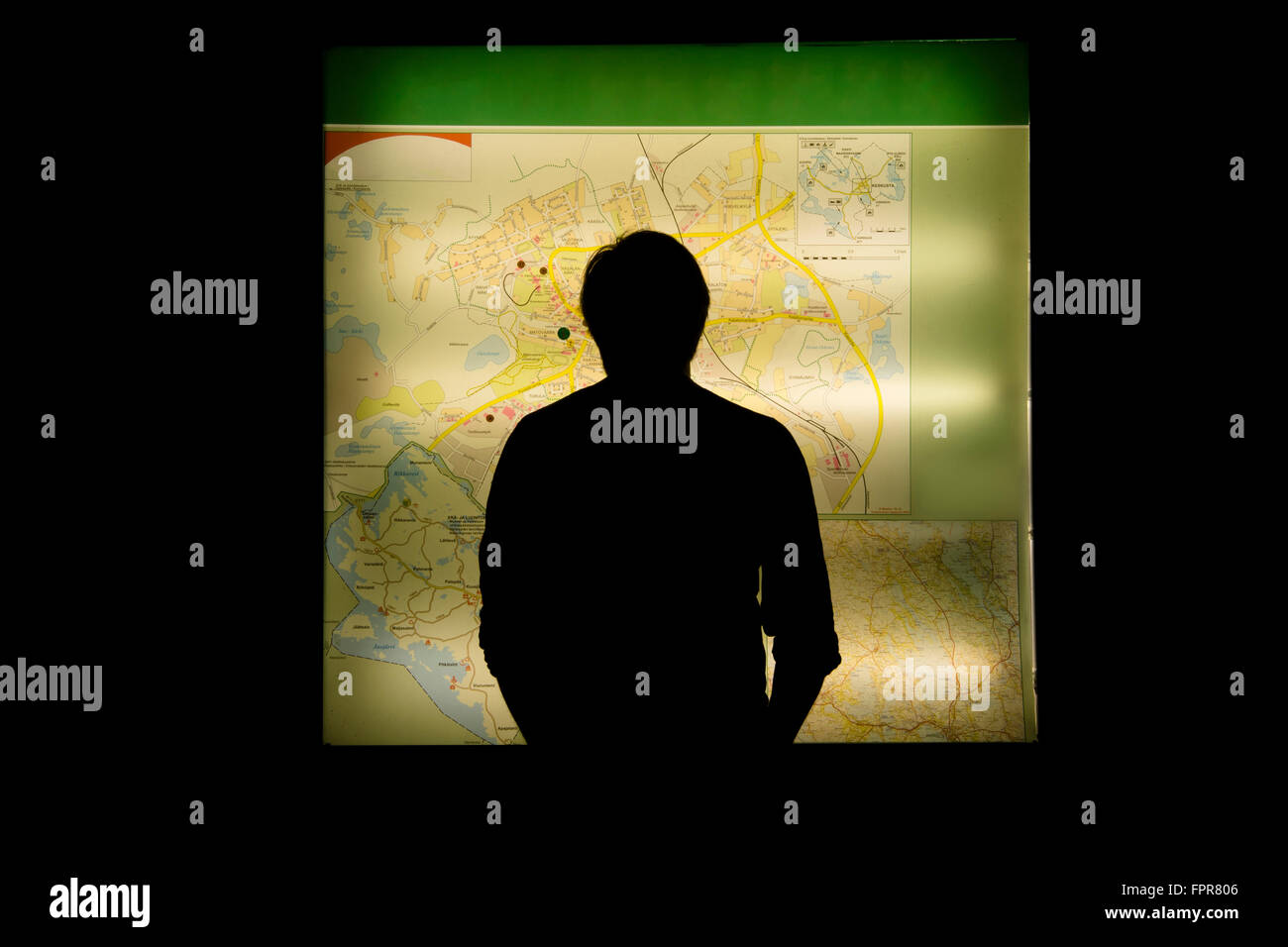 Man Looking at Map Stock Photo - Alamy