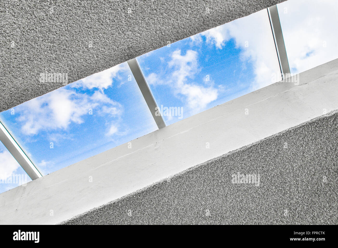 View of skylight in modern building with blue sky and clouds Stock ...