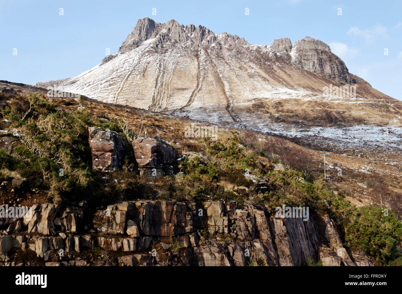 The rugged Stac Pollaidh (stack polly) mountain from the Summer Isles ...