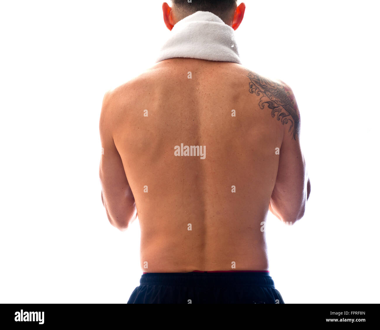 Shirtless middle age man showing lean back muscles Stock Photo - Alamy